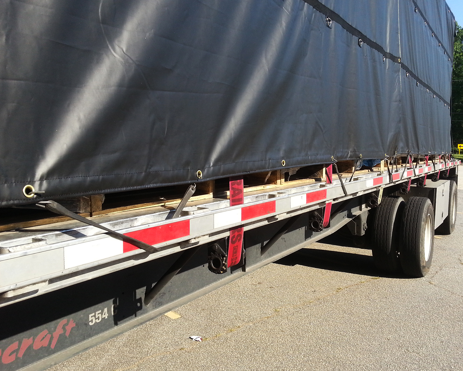 114 expandable asphalt bungee tarp for 102 wide body 550